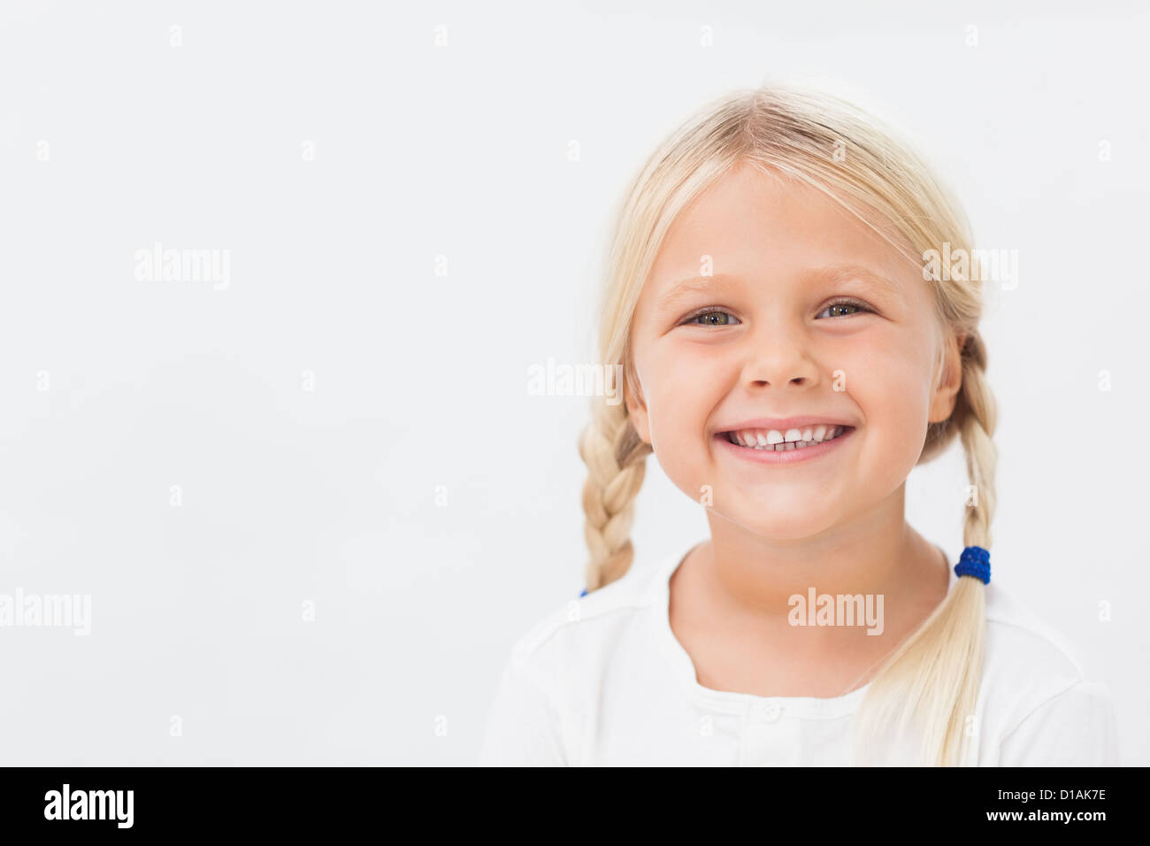 Cute girl smiling Stock Photo - Alamy