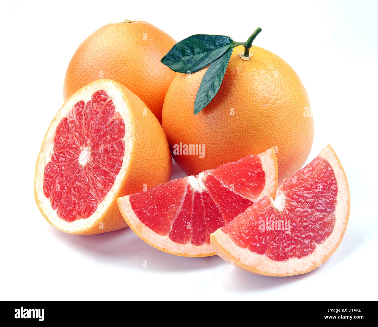 Grapefruit with segments on a white background Stock Photo - Alamy