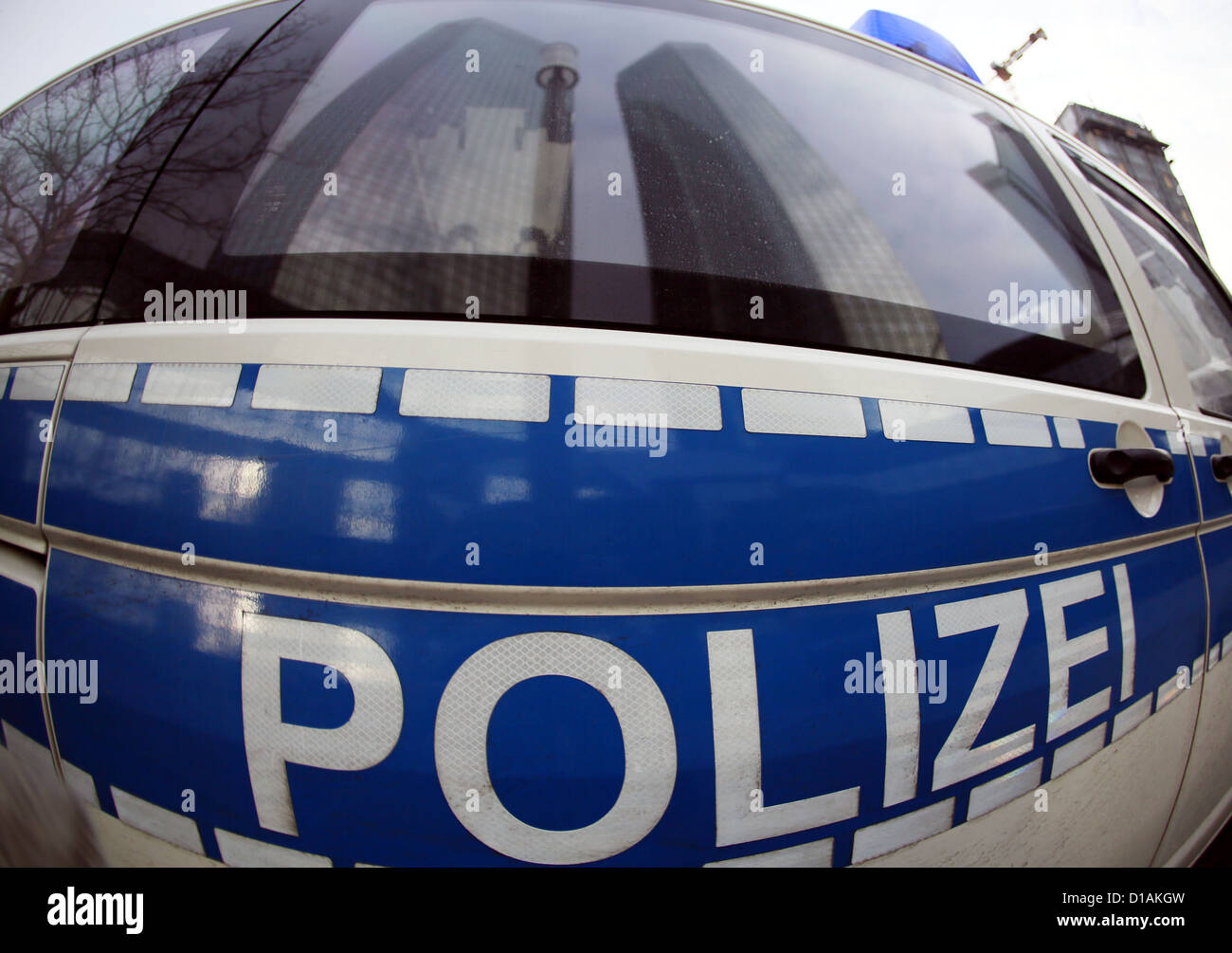 Police cars stand in front of the head office of Deutsche Bank in ...