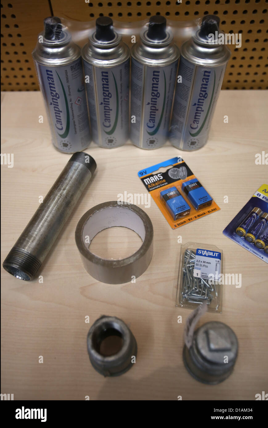 Items similar to the ones used in building the bomb lie on a table at ...