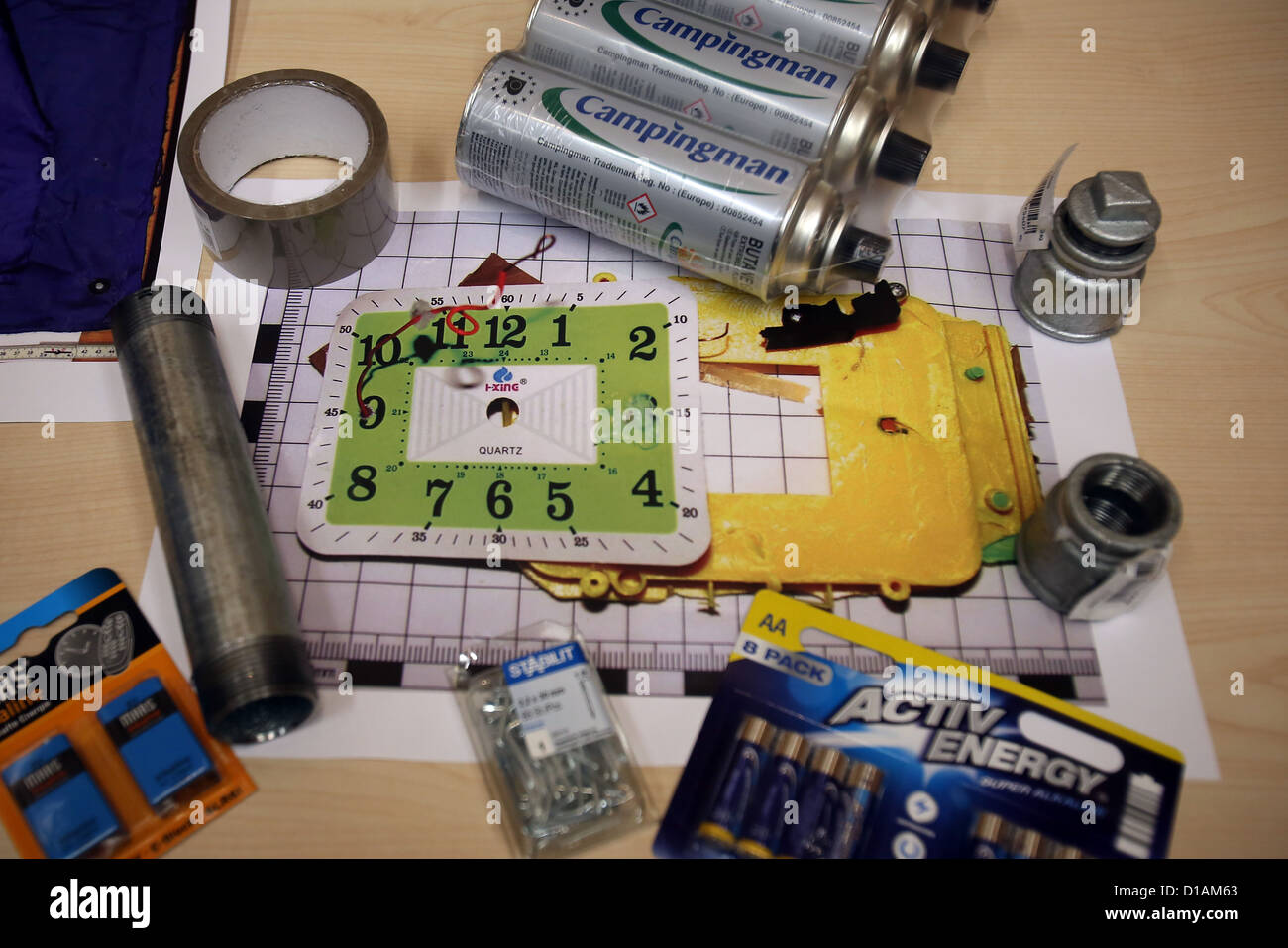 Items similar to the ones used in building the bomb lie on a table at ...
