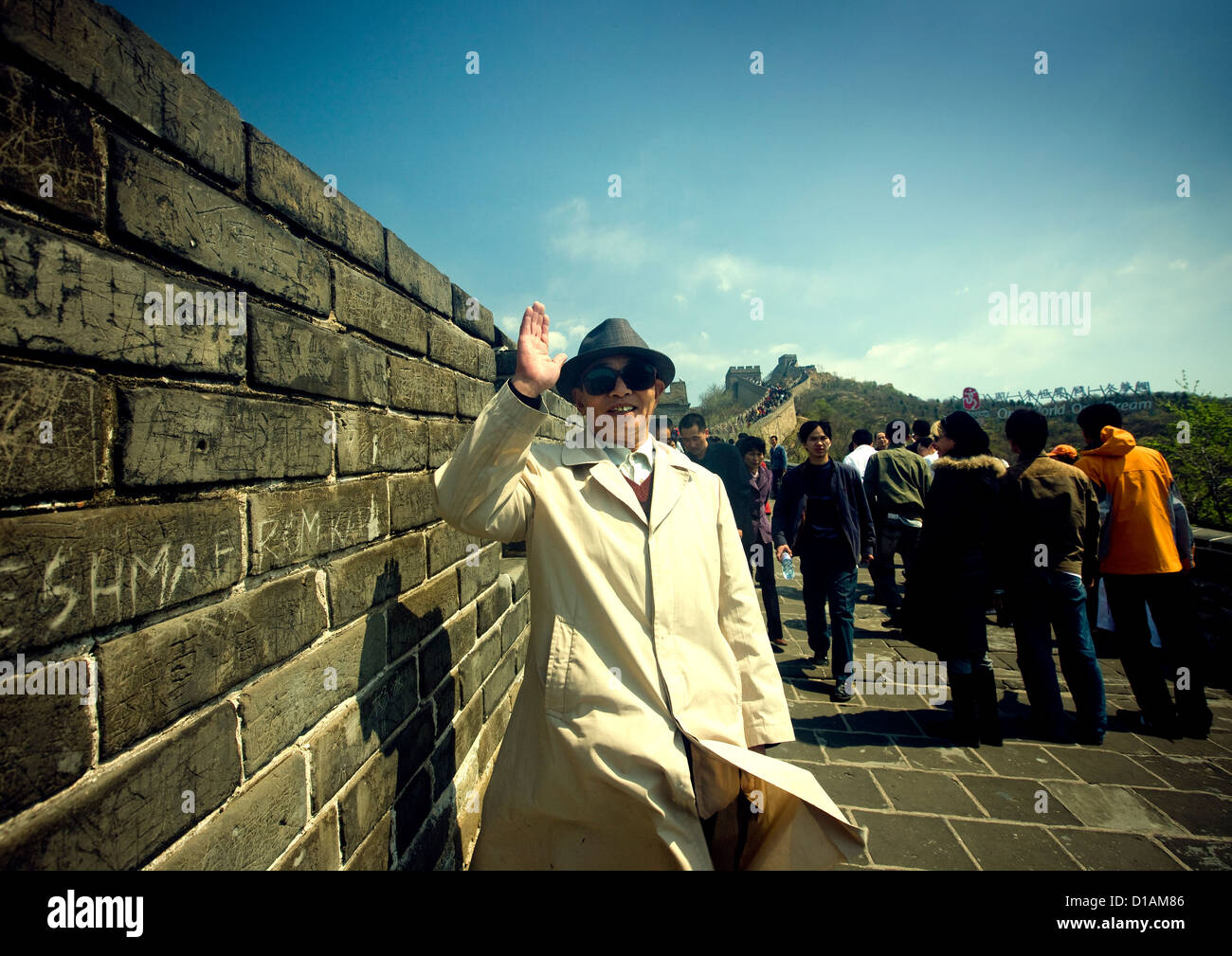 Chinese Old Man Saluting On The Great Wall, Beijing, China Stock Photo ...