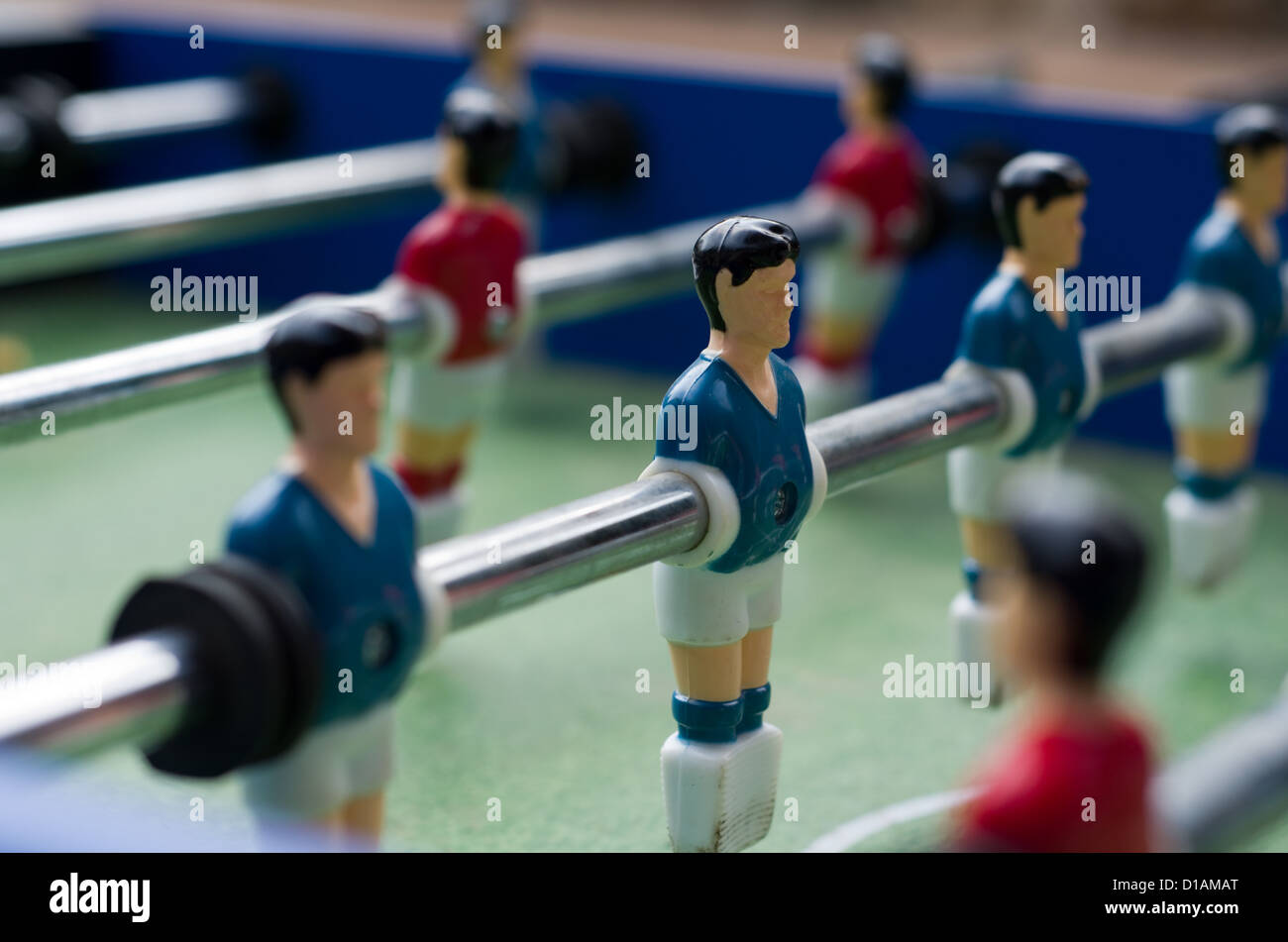 Blue table soccer players Stock Photo - Alamy