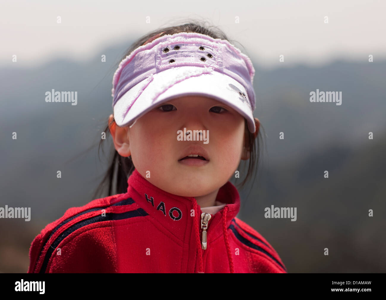 Chinese Gir With A Cap, Beijing, China Stock Photo - Alamy