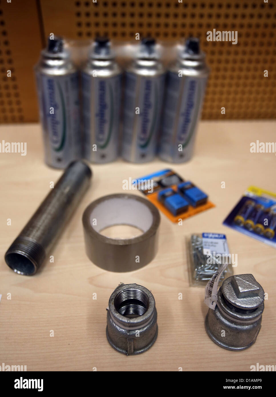 Items similar to the ones used in building the bomb lie on a table at ...