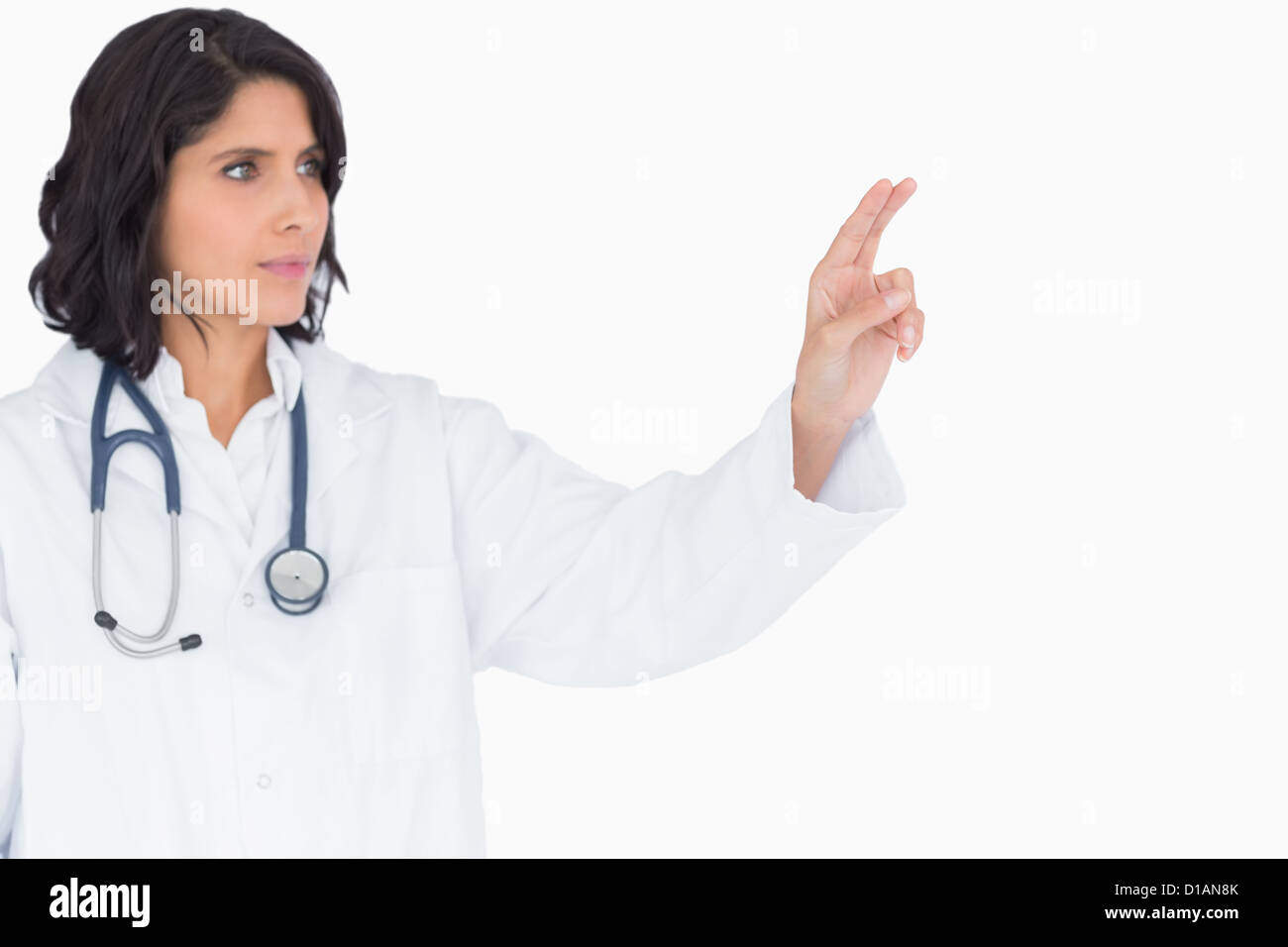 Doctor pointing to something Stock Photo - Alamy