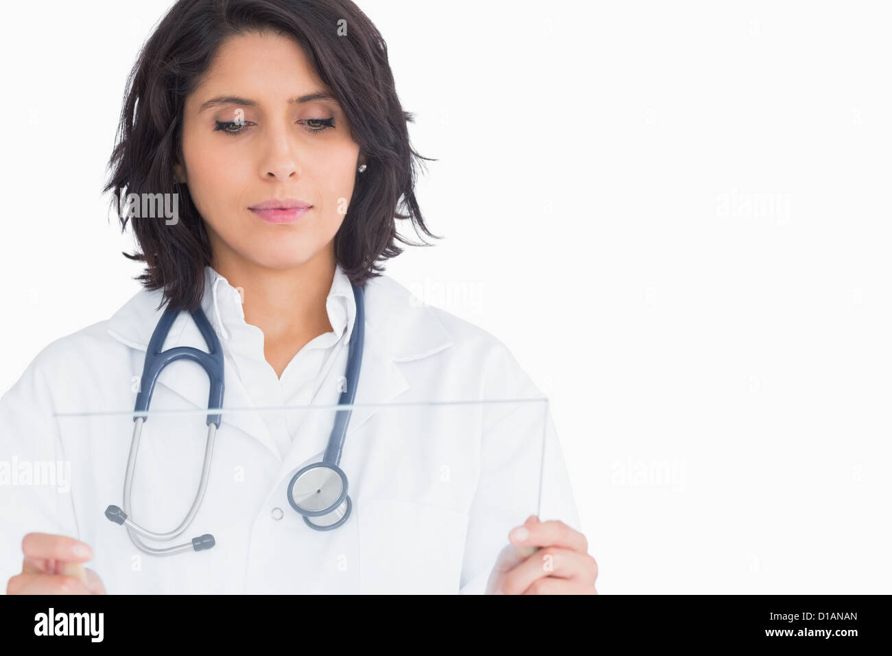 Doctor looking at virtual screen Stock Photo - Alamy