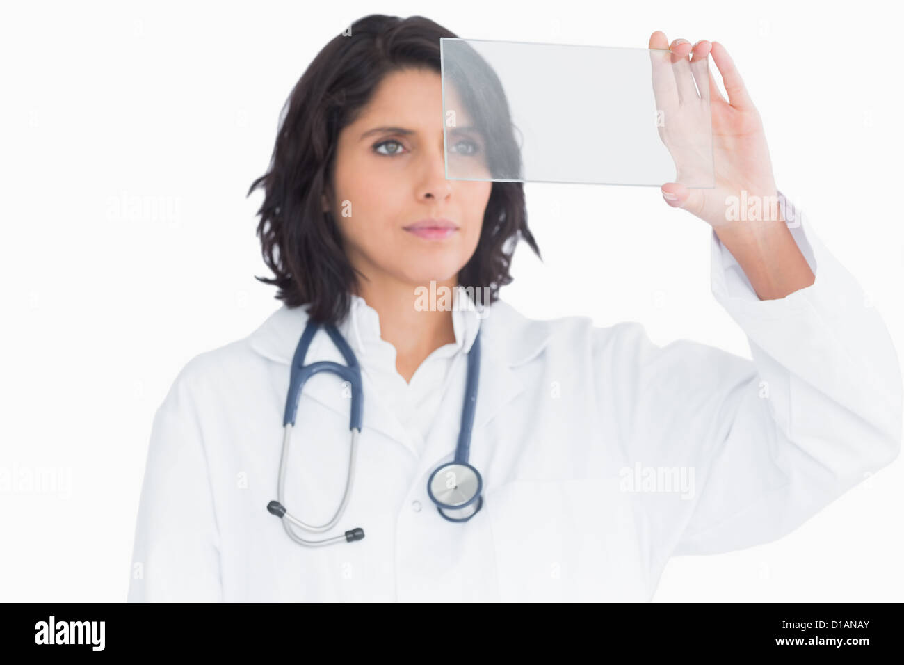 Doctor examining virtual screen Stock Photo - Alamy