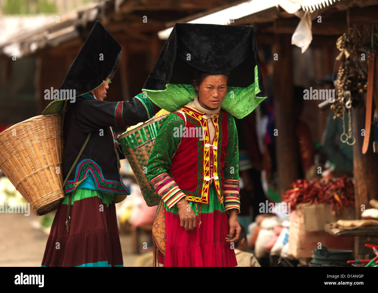 Yi Tribal Women In Traditional Clothes In A Market, Yongning, Yunnan ...