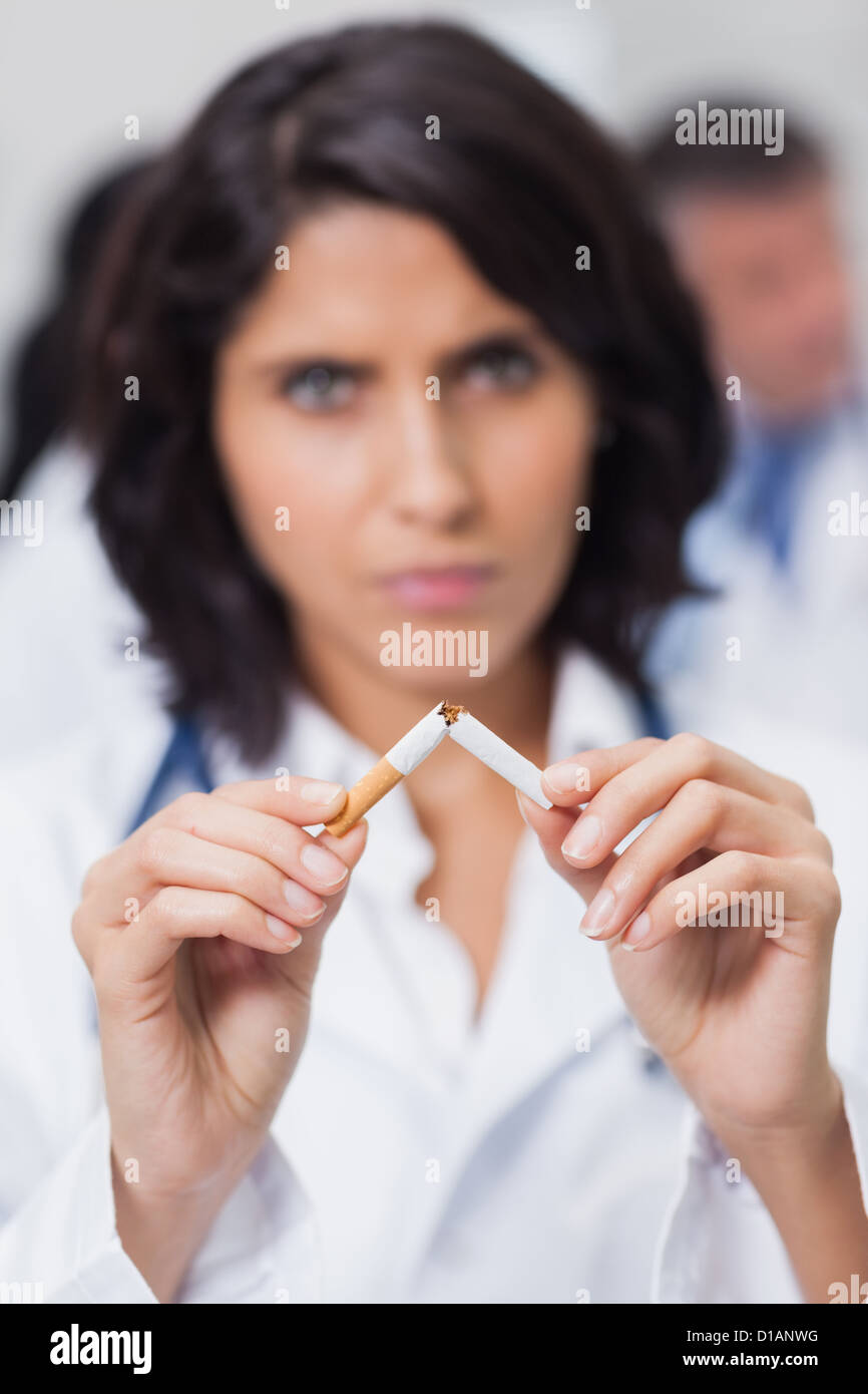 Doctor smoking cigarette hi-res stock photography and images - Alamy