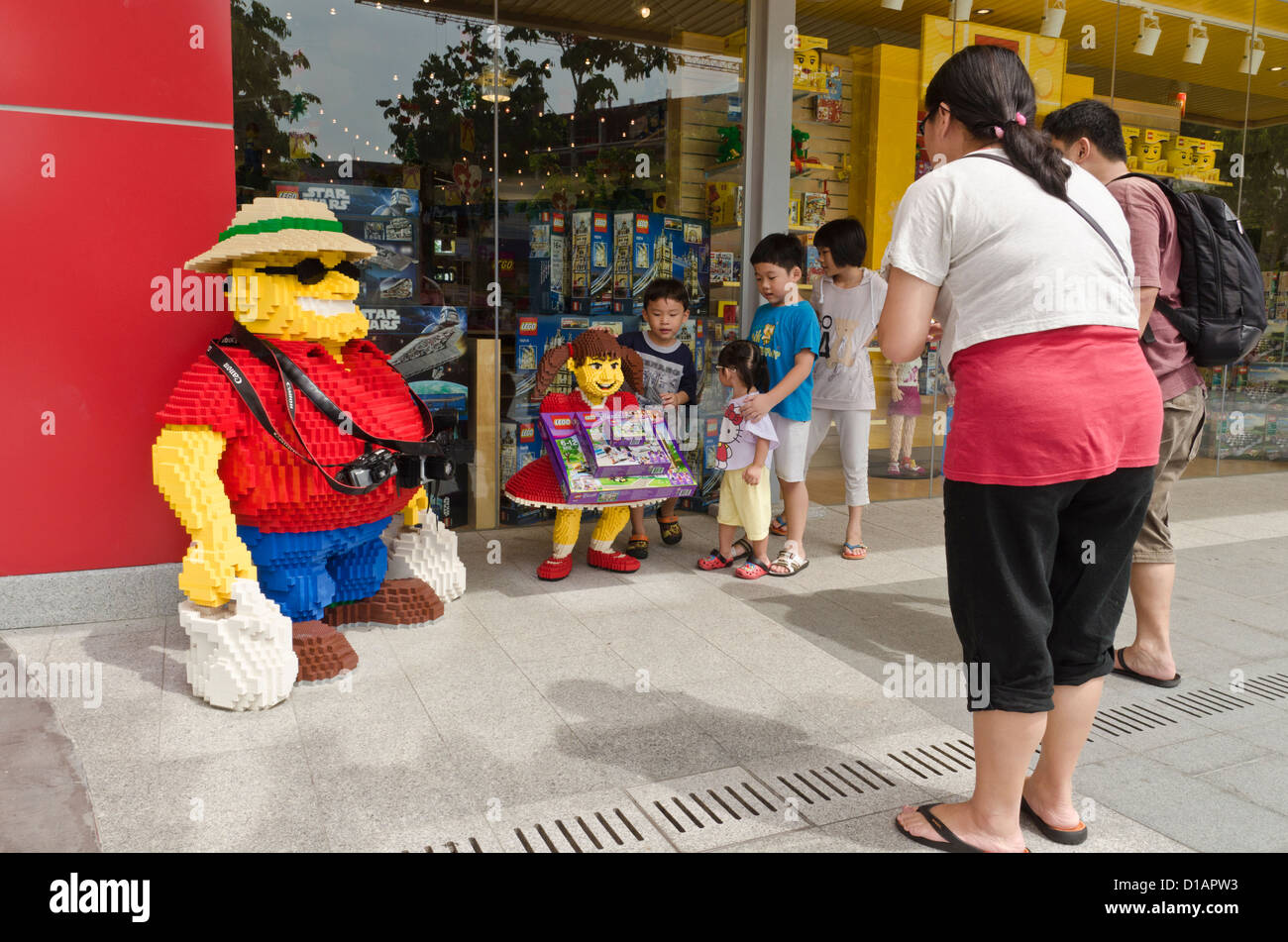 Tourists posing next to Lego people in Legoland, Malaysia Stock Photo ...