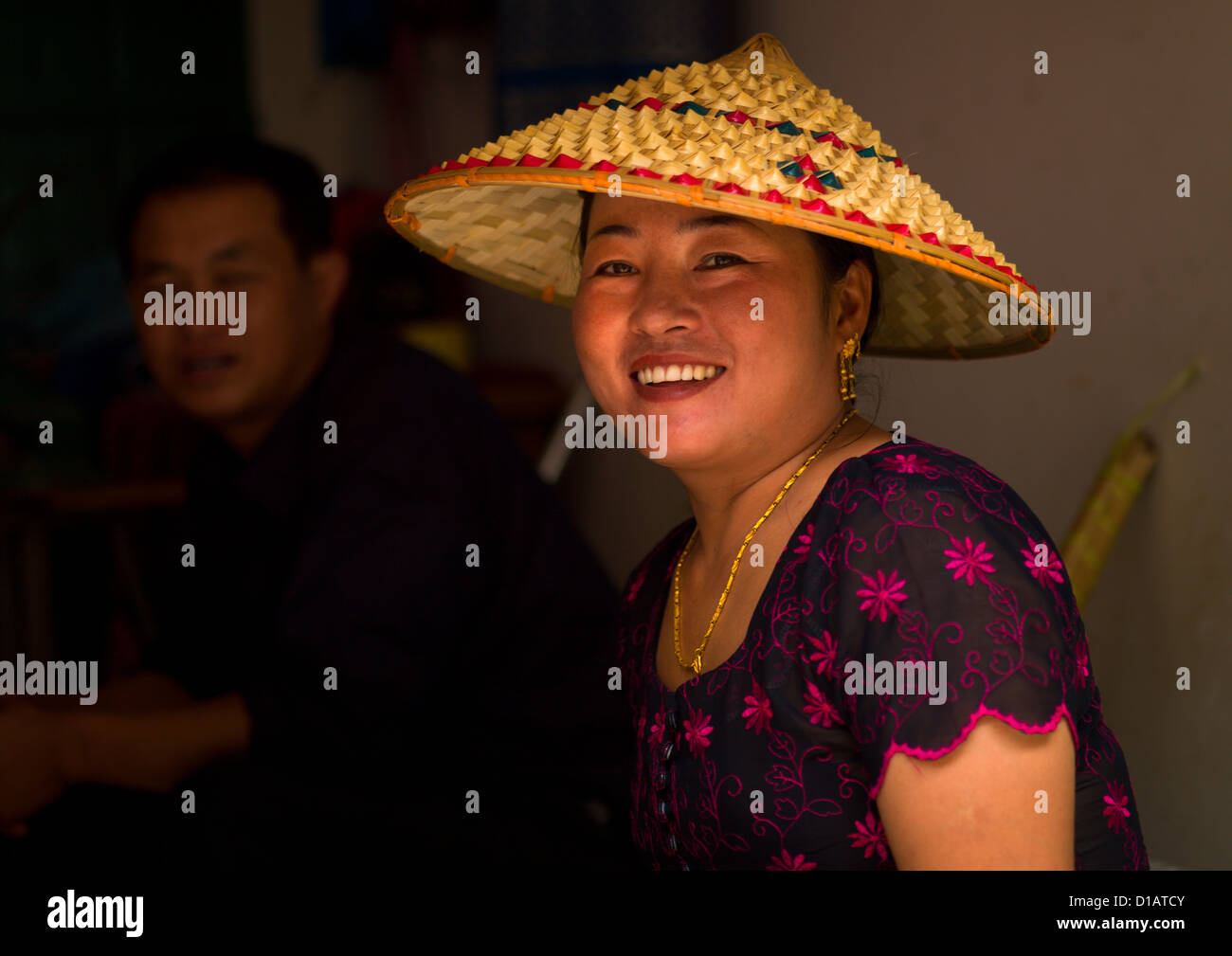 Woman With A Chinese Hat, Menglun, China Stock Photo - Alamy