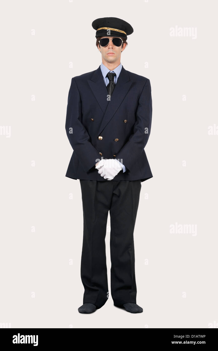 young man in pilot uniform sitting Stock Photo - Alamy