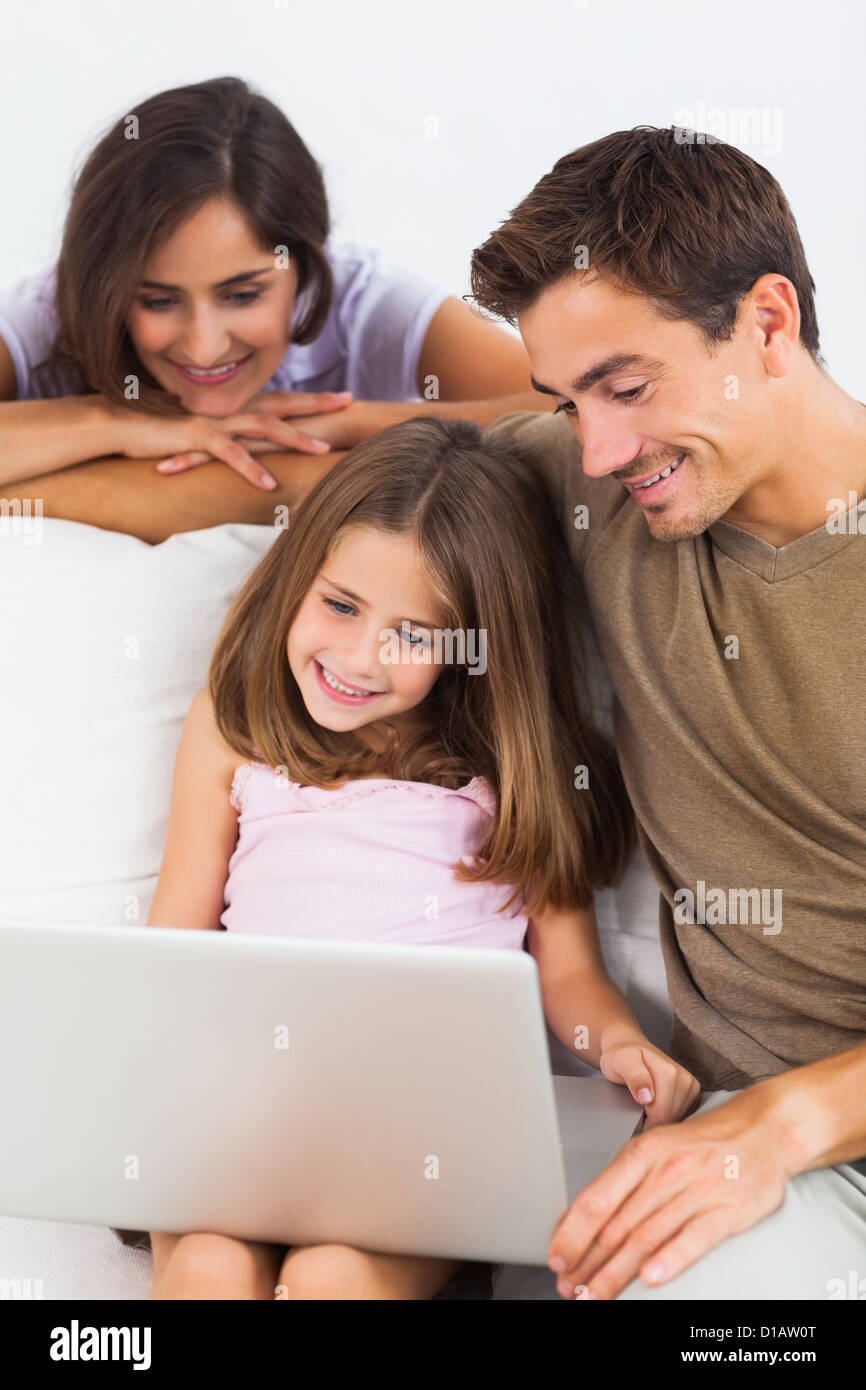 Family using the laptop Stock Photo - Alamy