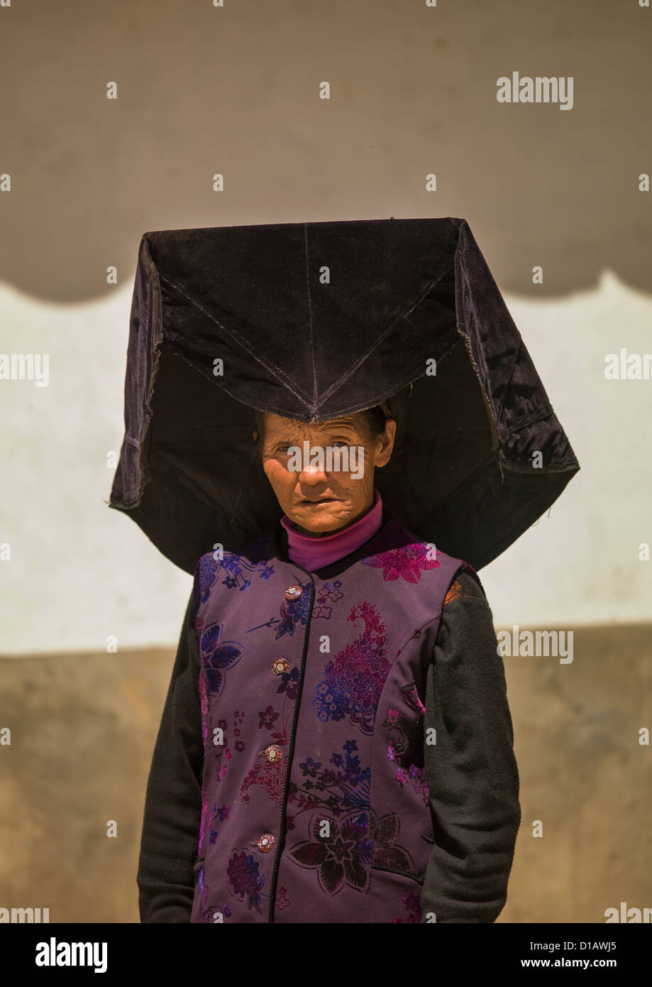 Yi Tribal Woman In Traditional Clothes, Yongsheng, Yunnan Province ...