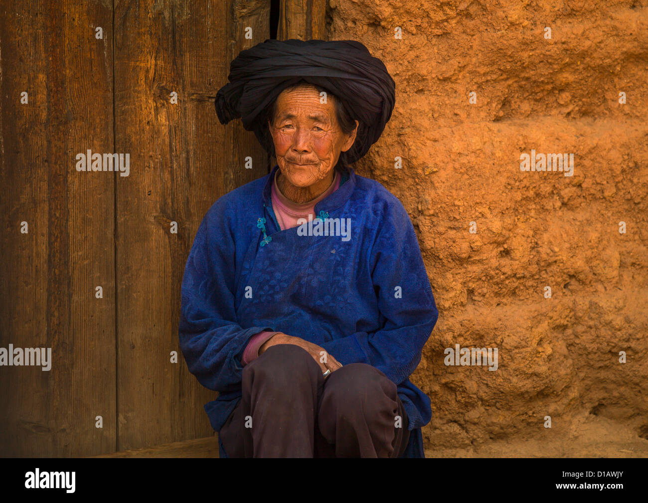 Yi Tribal Woman In Traditional Clothes, Yongsheng, Yunnan Province ...