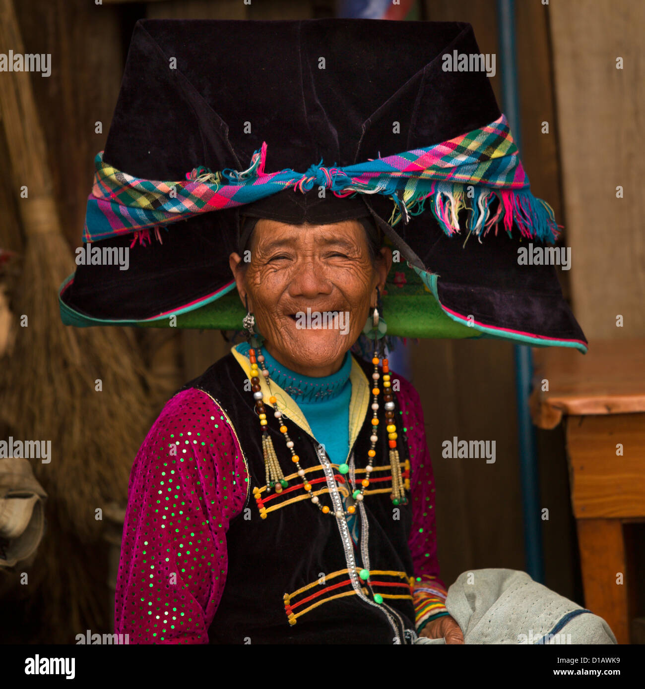 Yi Tribal Woman In Traditional Clothes, Yongsheng, Yunnan Province ...