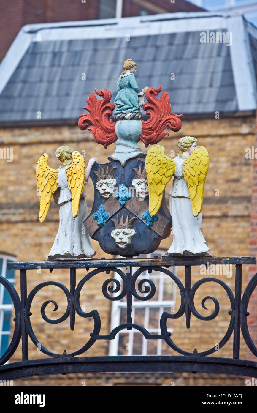 London, Guy's Hospital Guy's coat of arms (reverse) over the main gates ...