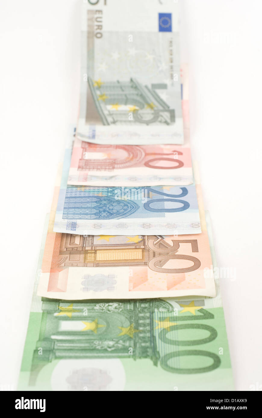 Euro banknotes disappearing in the horizon. Isolated on white Stock ...