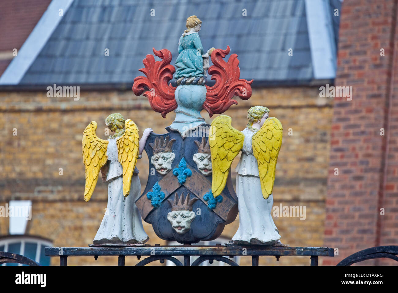 London, Guy's Hospital Guy's coat of arms (reverse) over the main gates ...