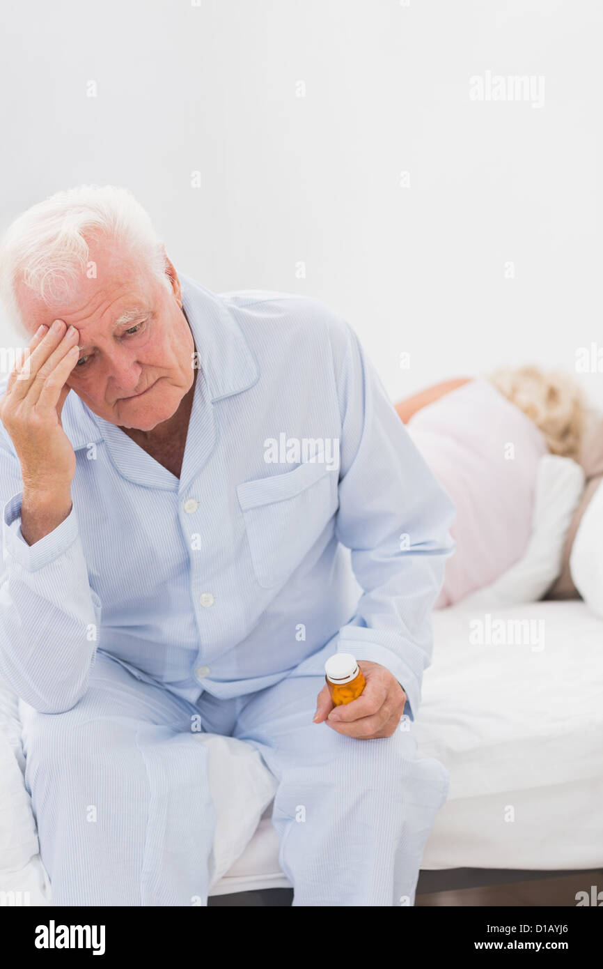 Old man having a headache Stock Photo - Alamy