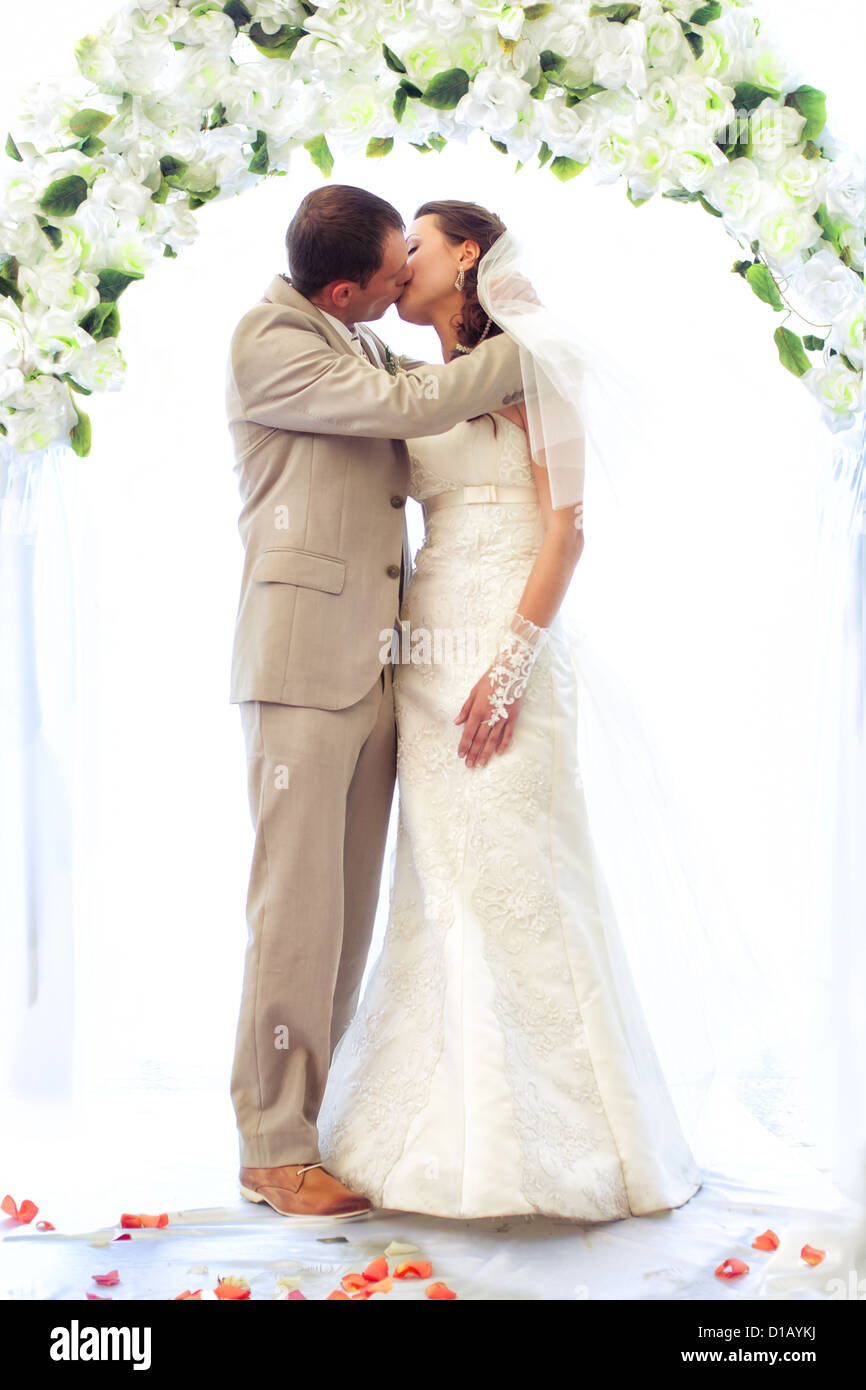 Bride and groom kissing close-up Stock Photo - Alamy