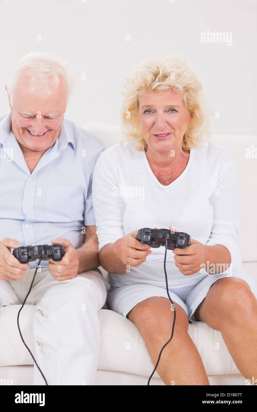 Old couple playing video games Stock Photo - Alamy