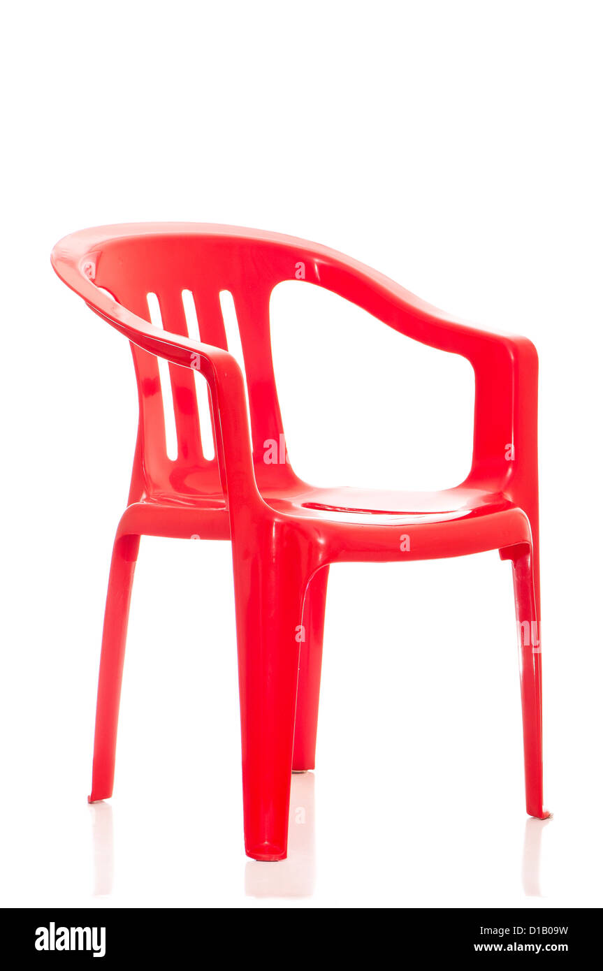 Red, plastic chair on white background Stock Photo - Alamy