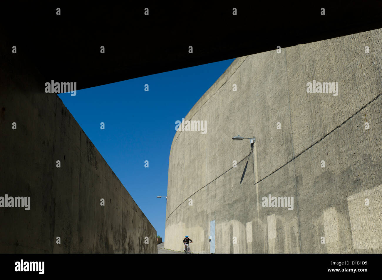 Concrete architecture,curved wall, blue sky Stock Photo - Alamy