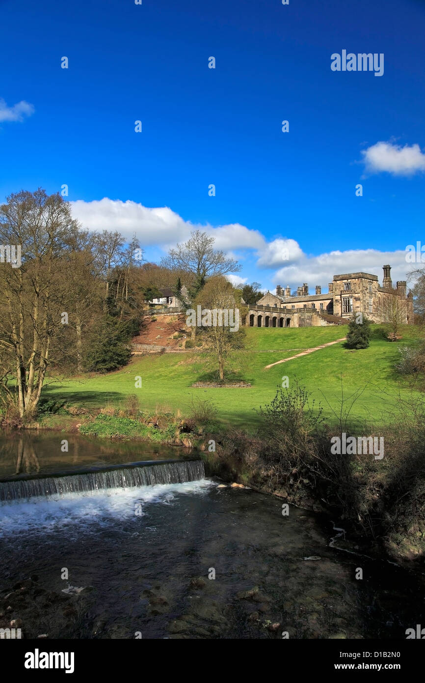 The river Manifold and Ilam Hall in the village of Ilam, Staffordshire ...