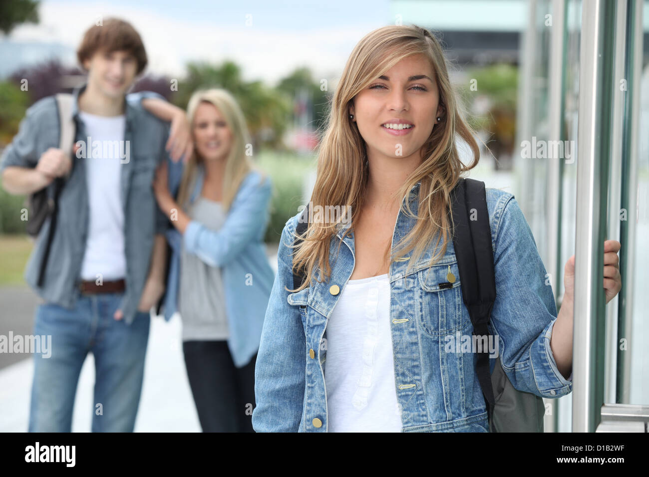 Friends going to college Stock Photo - Alamy