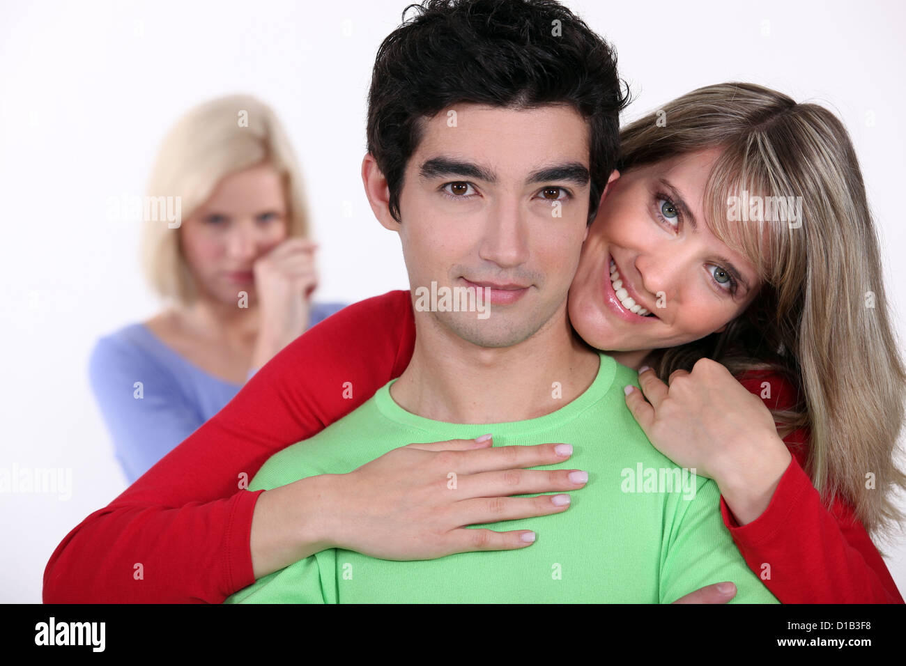 Woman jealous of couple Stock Photo - Alamy