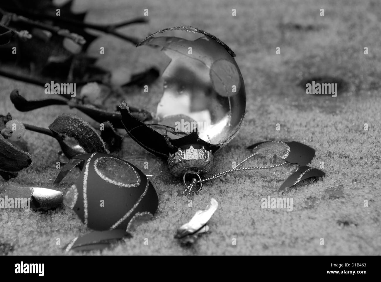 Smashed Christmas baubles with mistletoe Stock Photo - Alamy