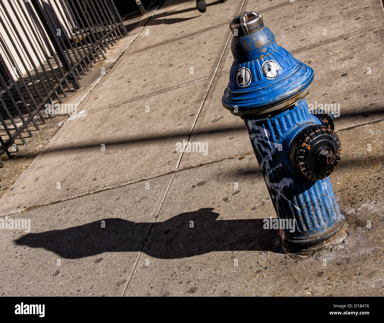 Old blue fire hydrant on a Manhattan sidewalk Stock Photo - Alamy