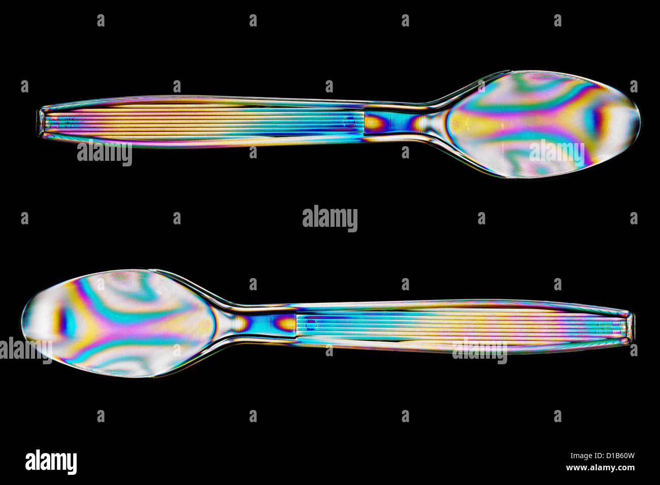 Polarized plastic spoons Stock Photo - Alamy