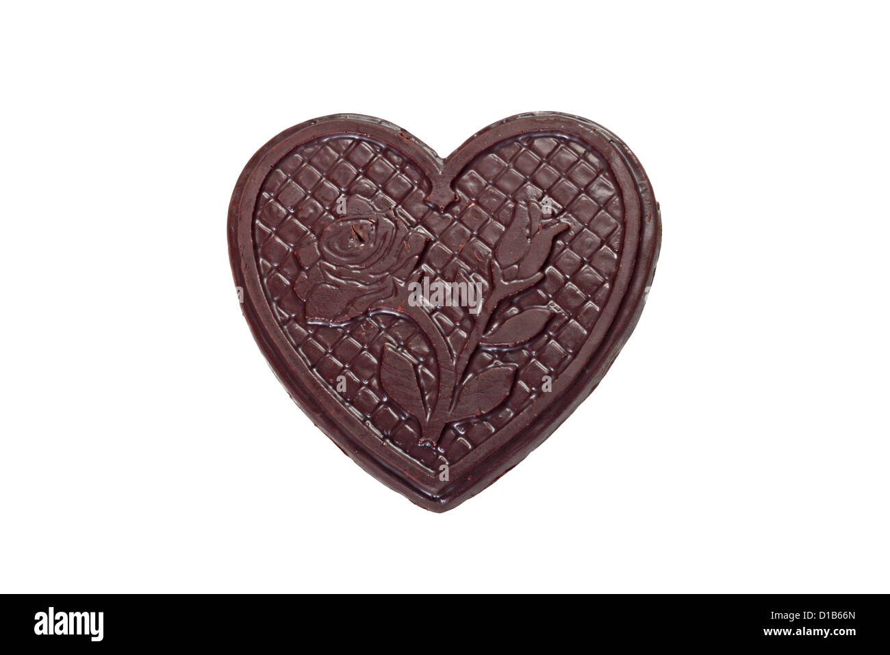 Brown chocolate heart with impressed rose isolated on white background ...