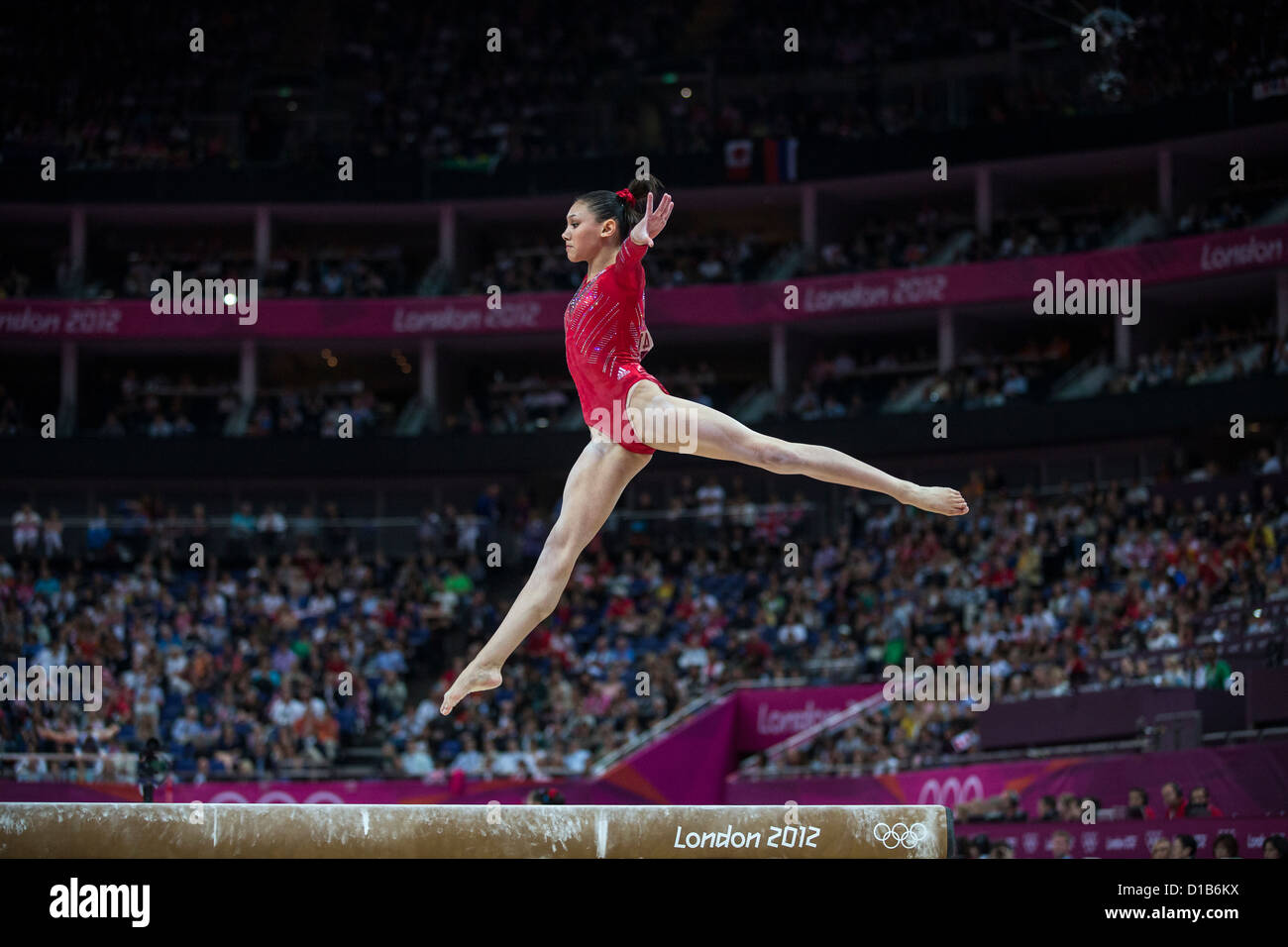 Kyla Ross (USA) competes on the balance beam during the women's ...