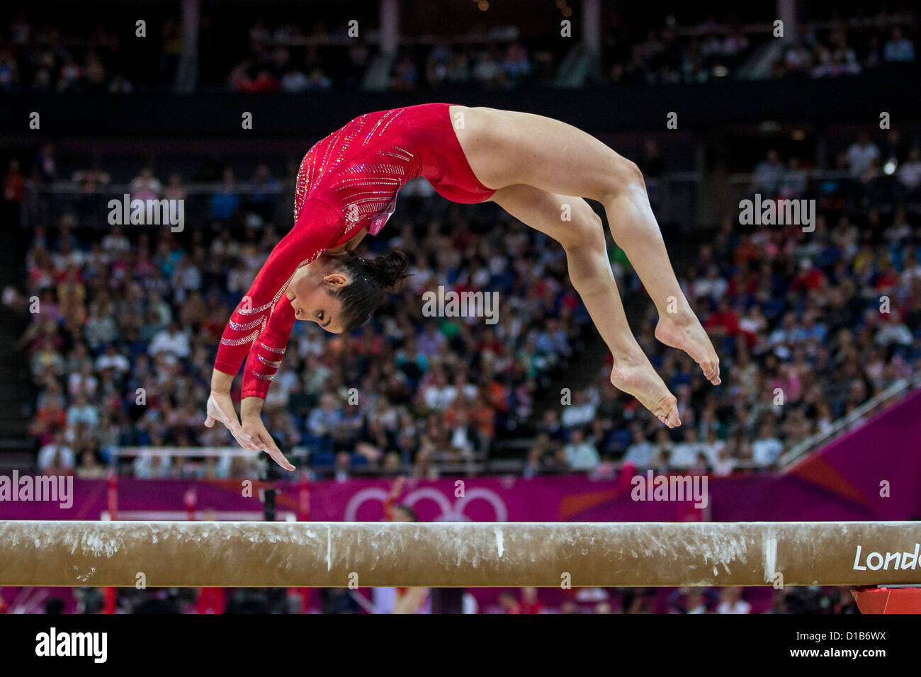 Gymnast jumping on beam hi-res stock photography and images - Alamy