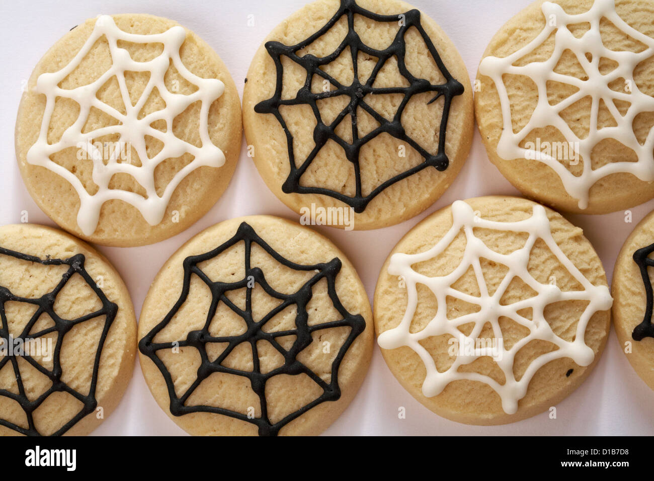 Halloween mini spider web biscuits set on white background - looking ...