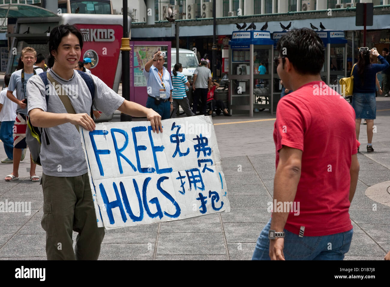 Free hugs street hi-res stock photography and images - Alamy