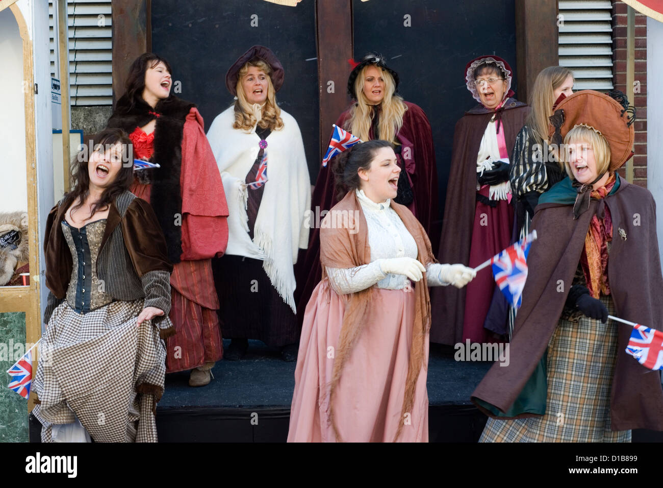 singers and dancers putting on a show at the victorian festival of ...