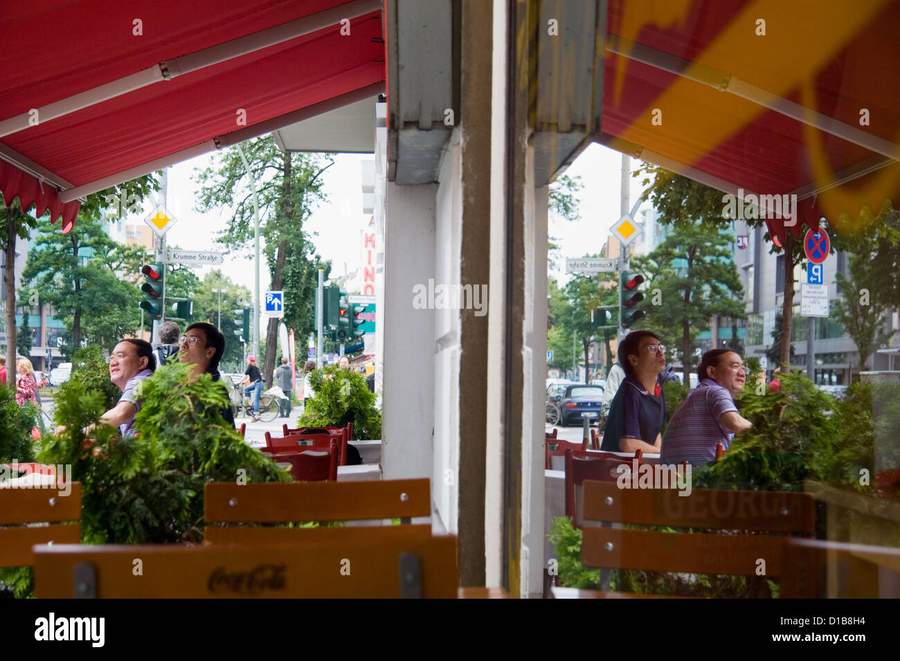 Berlin, Germany, two Asians in a cafe Stock Photo - Alamy