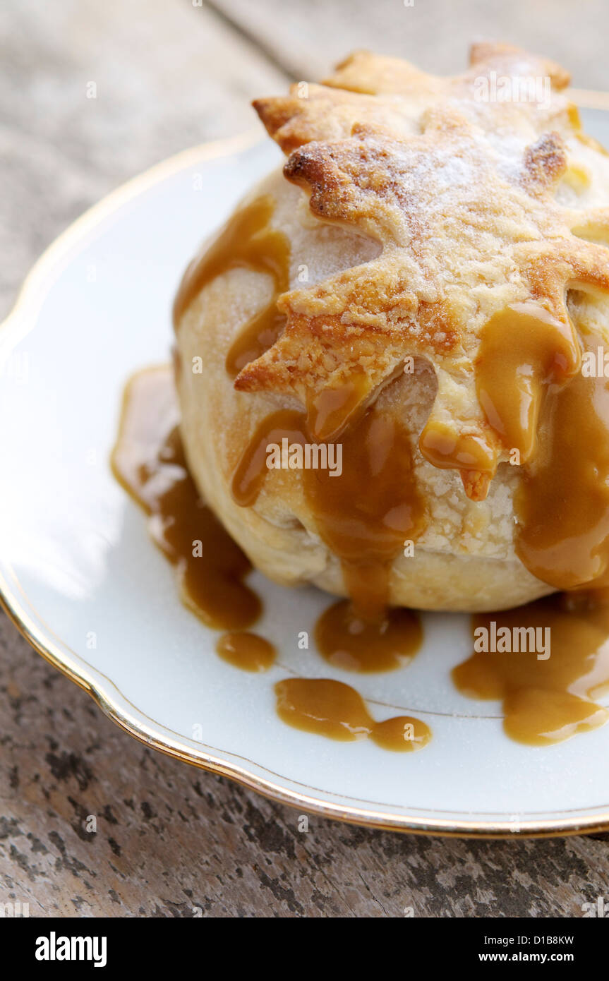 Apple dumplings filled with a dried fruit mix and served with a vegan ...