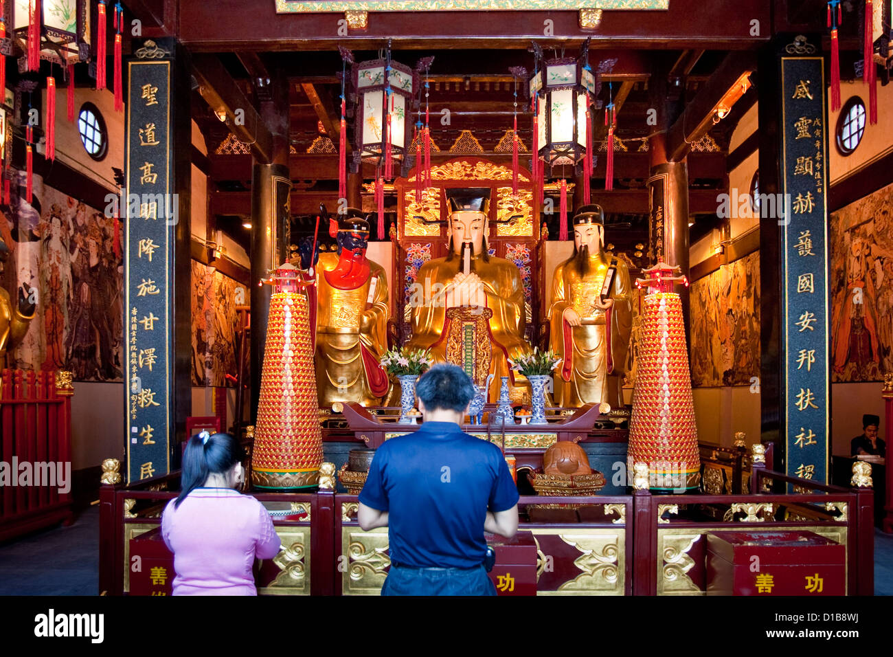 Monk and Woman Praying, City Temple, Shanghai, China Stock Photo - Alamy
