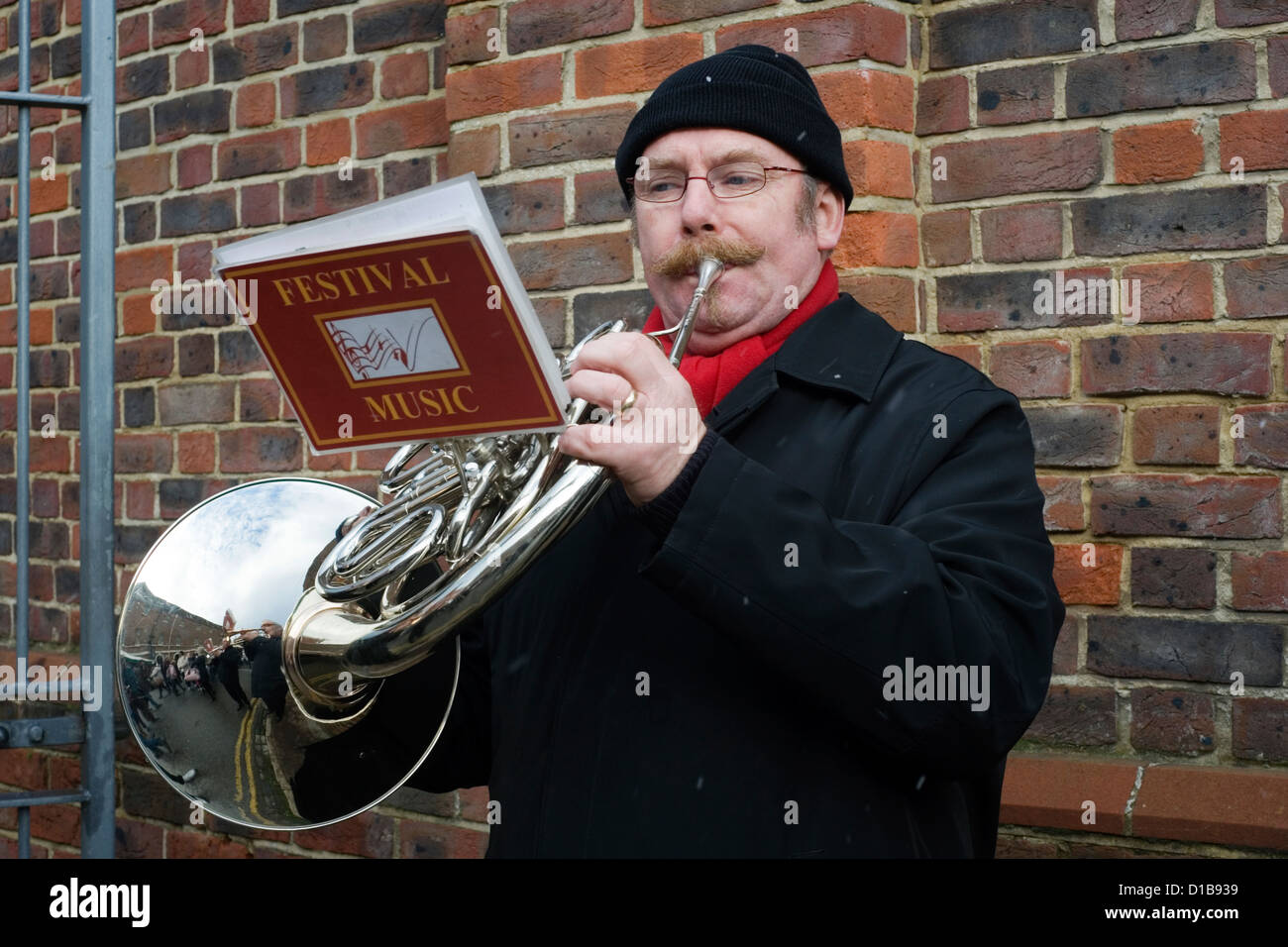 musician with wind instrument playing carols at the victorian festival ...