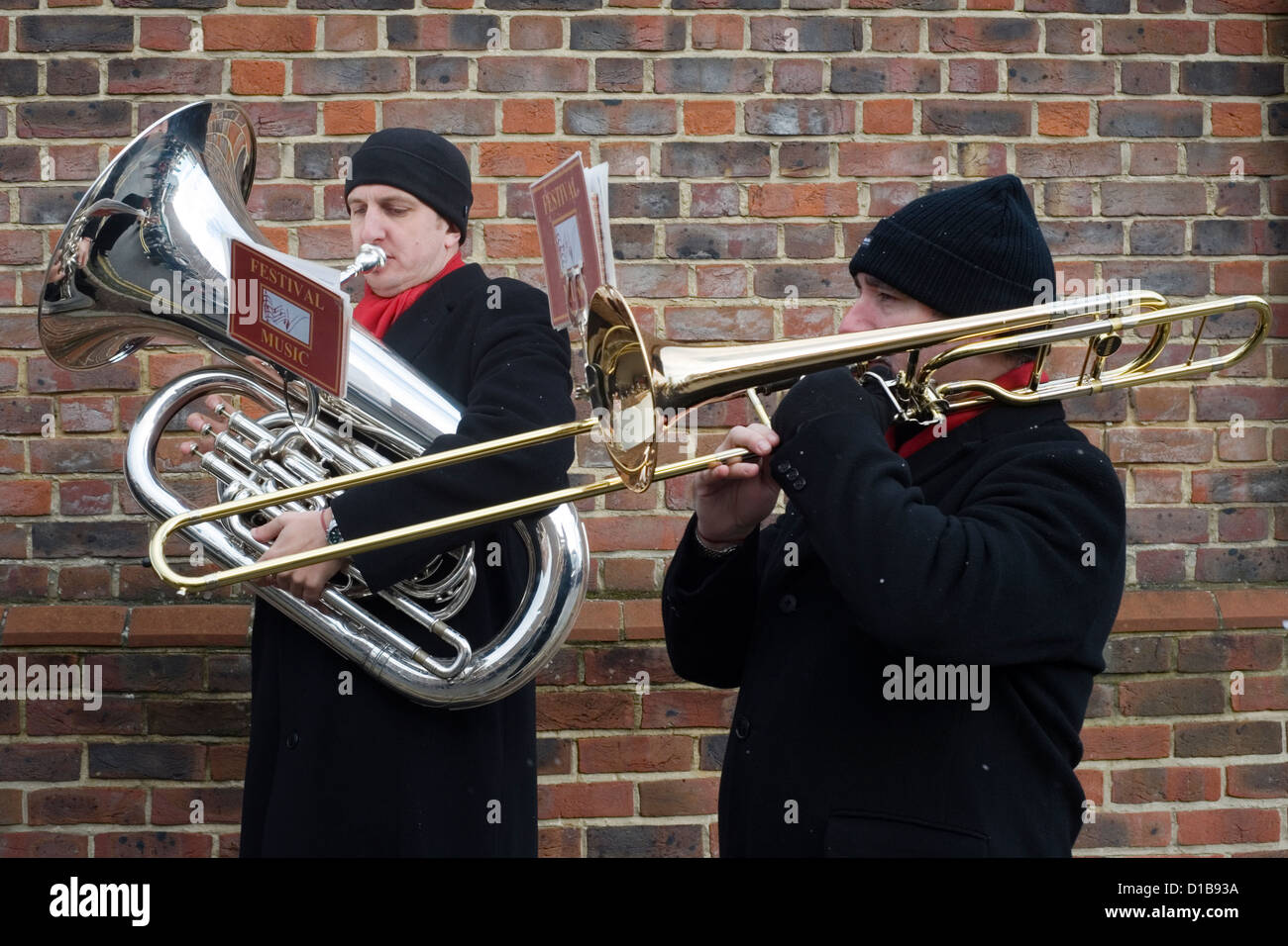 two men with wind instruments play carols at the victorian festival of ...