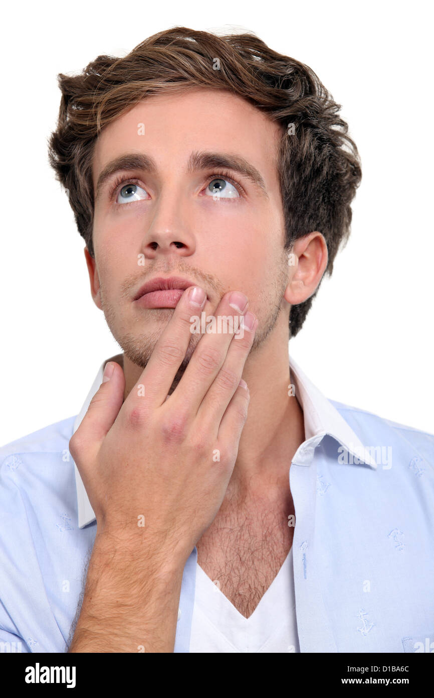 young man thinking Stock Photo - Alamy