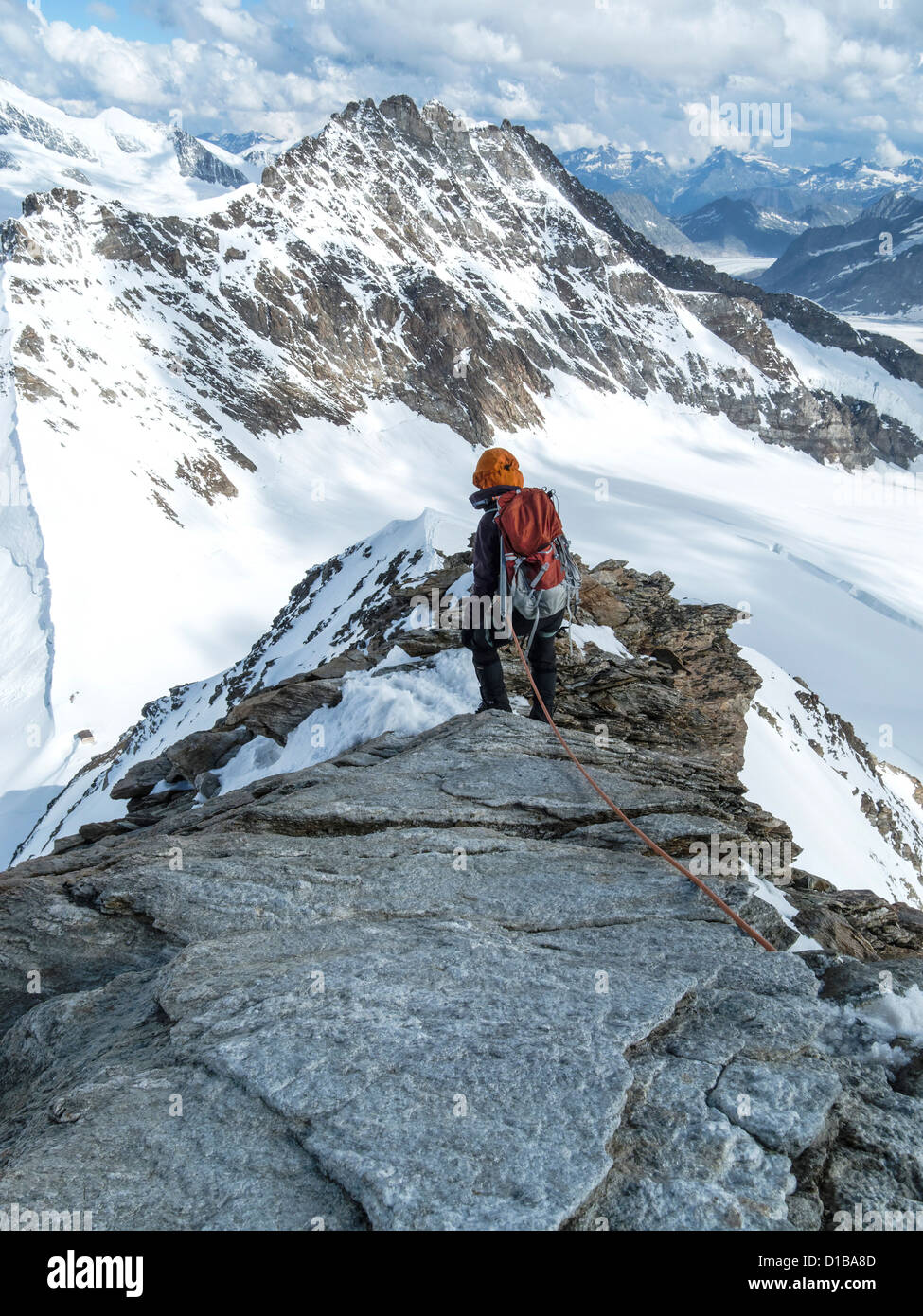 A climber on the Monch in the Bernese Oberland Stock Photo - Alamy