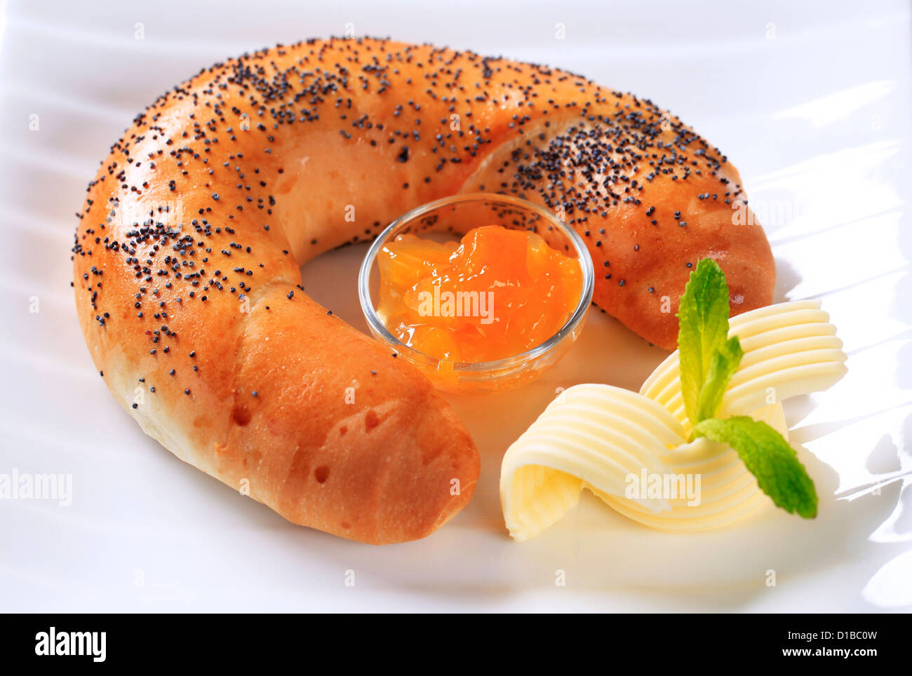Sweet poppy seed roll, butter and fruit preserve Stock Photo - Alamy