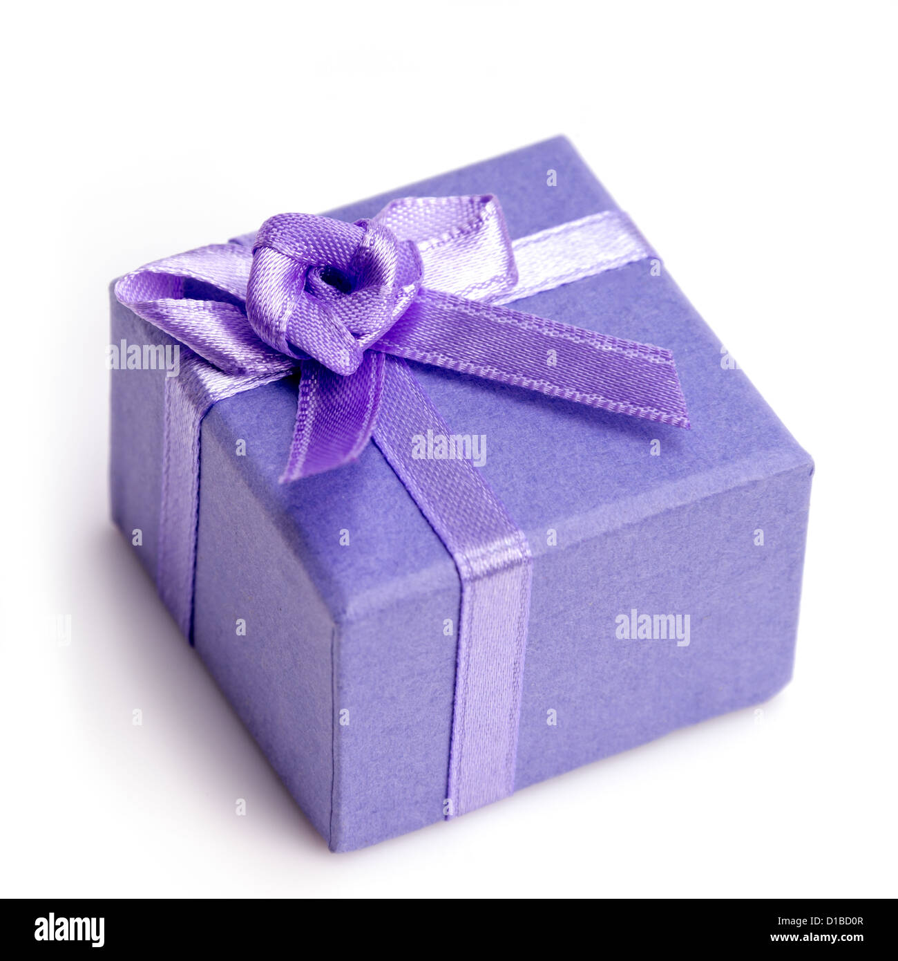 Small purple gift box isolated on white background with light shadow ...